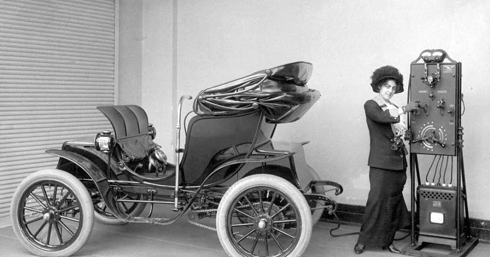 transpress nz: electric car being recharged, pre WW1