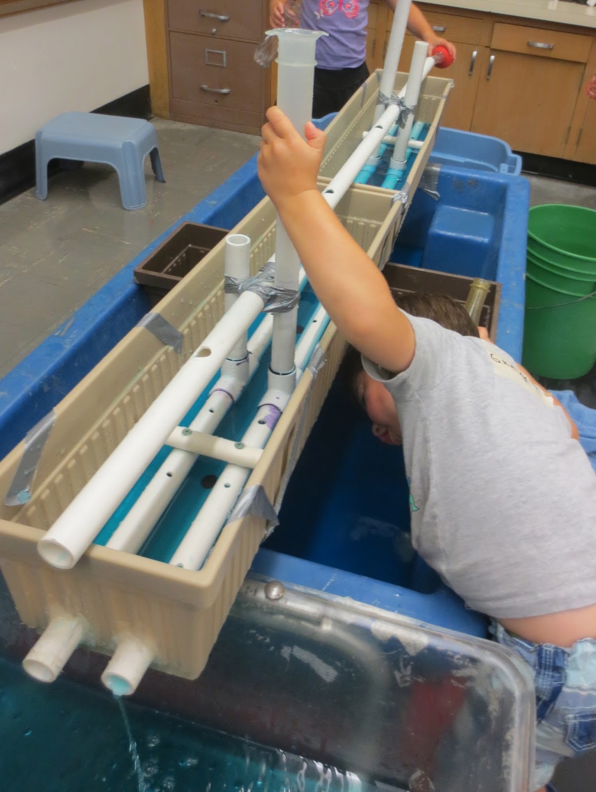 SAND AND WATER TABLES: PIPES EMBEDDED IN TRAYS