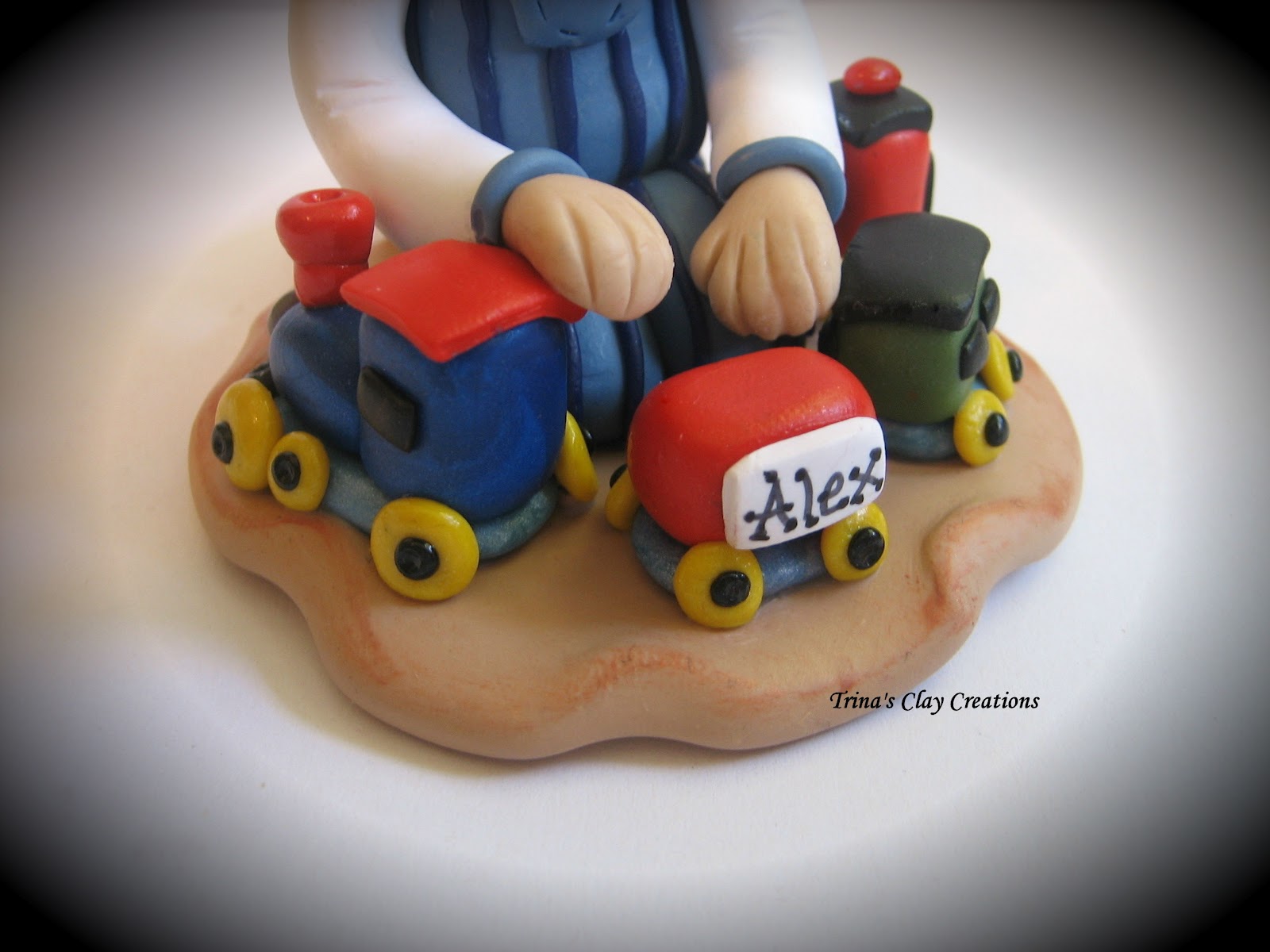 Trina's Trinketts: A Polymer Clay Train and Conductor