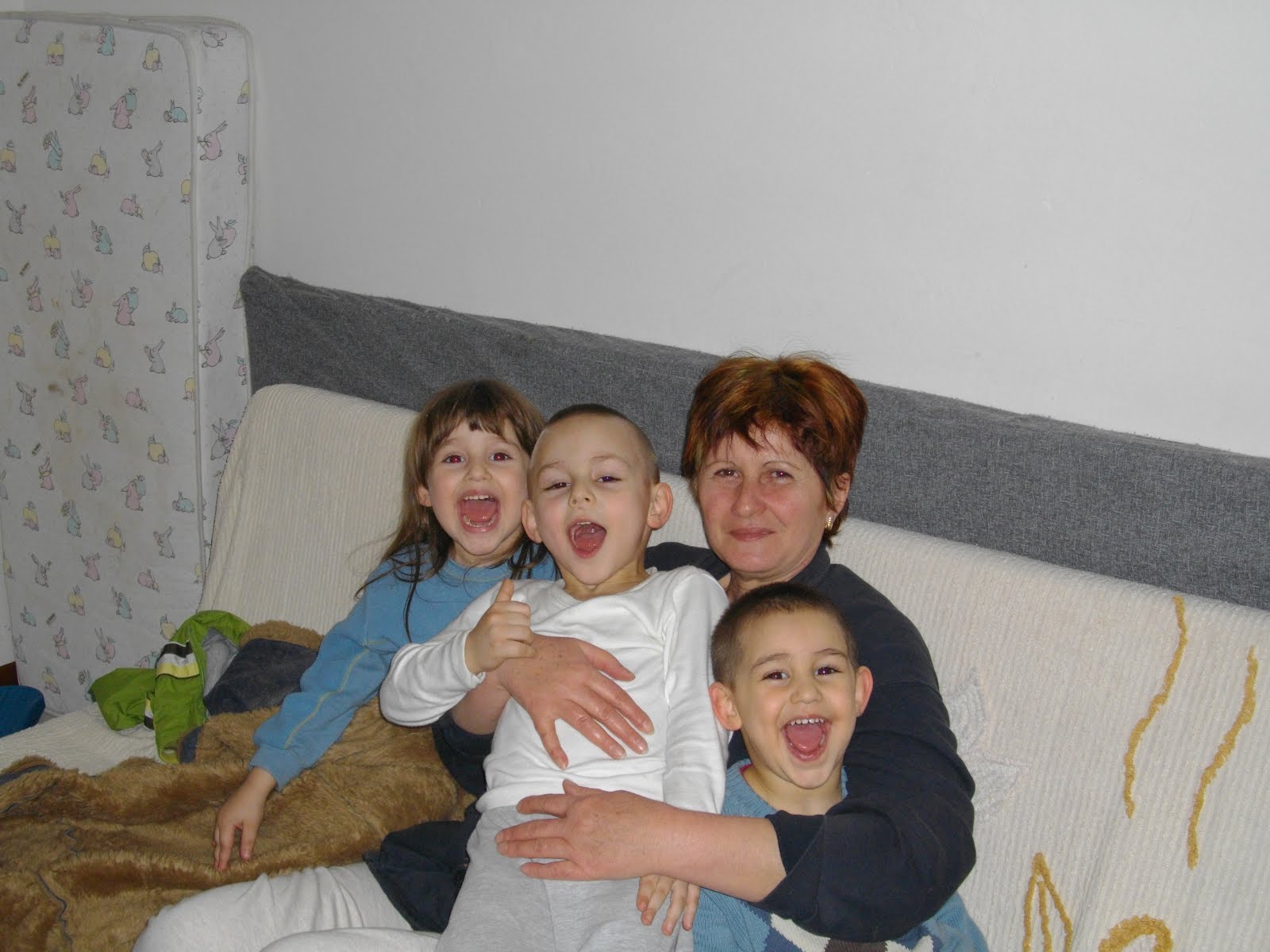 Giuliano Stroe: little Stroe brother with grandmother