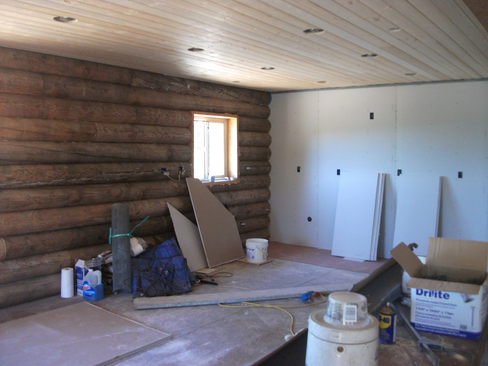 LOG CABIN: Drywall and fire place mantel June 20, 2012