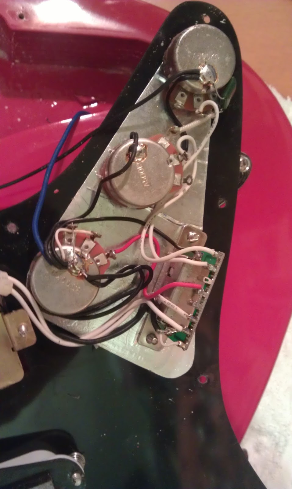 Shielding and upgrading the electronics on a Stratocaster-style guitar ...