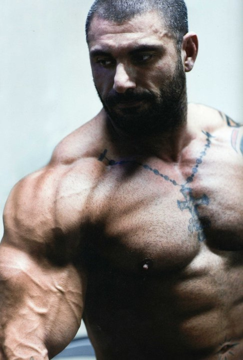 The Life Of A Bodybuilder: christian bodybuilder with biceps closeup