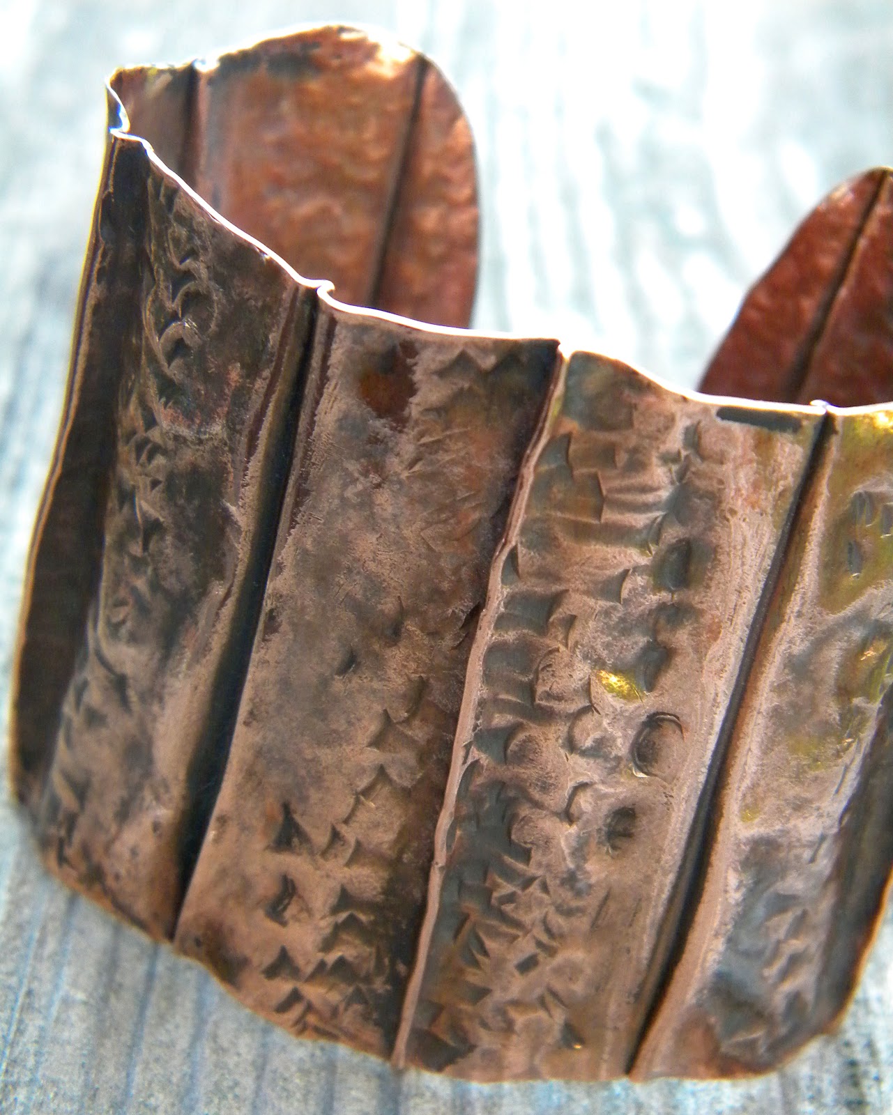 Cake and Jewelry: Fold formed copper with a heat patina