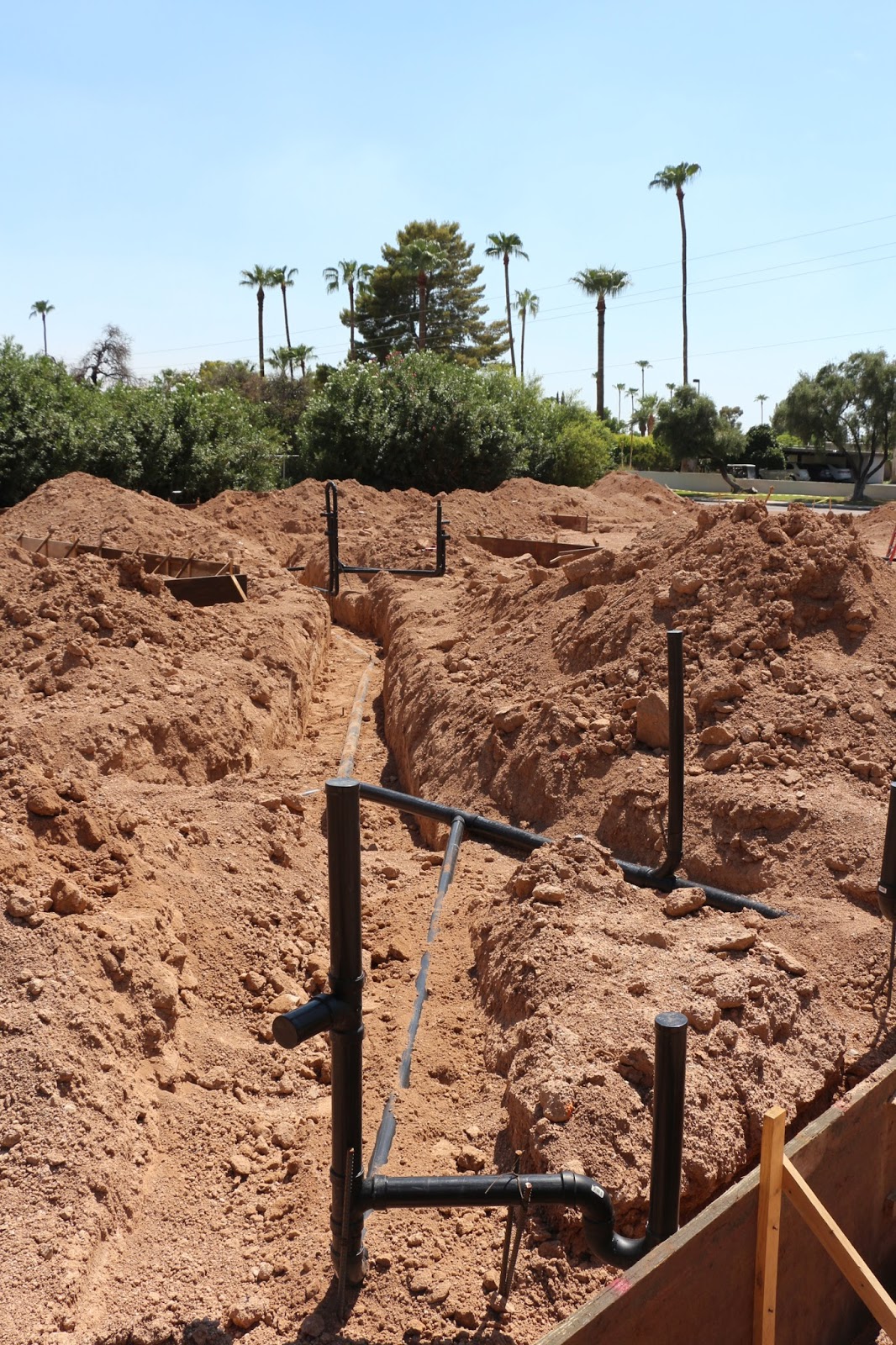 Dusty Coyote: Finished Grading, Footings, Plumbing, and Water