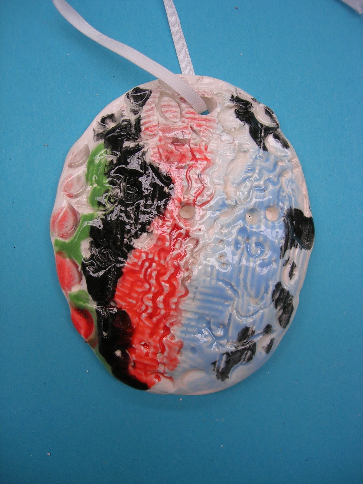 Mrs. Manzella's Student Gallery: 1ST GRADE: CLAY TEXTURED