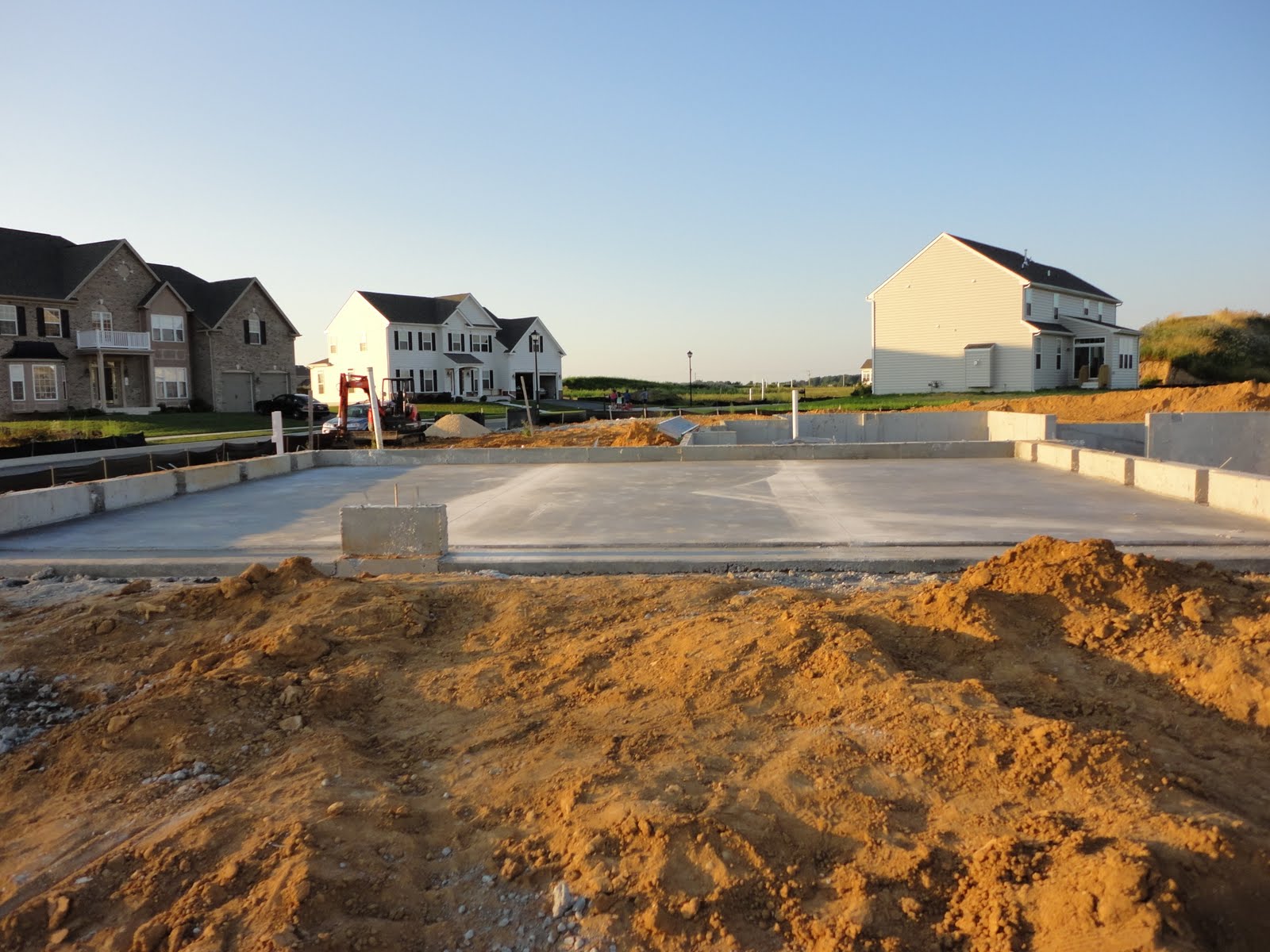 Building a Ryan Homes Avalon: Backfill, Basement, and Garage Floor