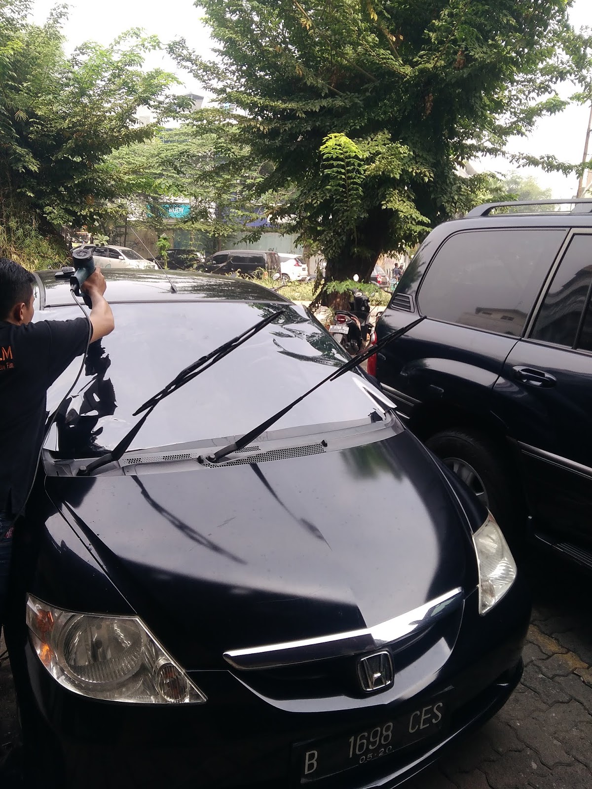 Kaca film mobil dan gedung EVOLUTION'S(SMART AUTO SOLUTION)