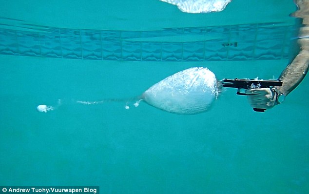 MissK's World...: Beauty of shooting handgun UNDERWATER