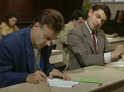 شيماء: Mr Bean writing an exam