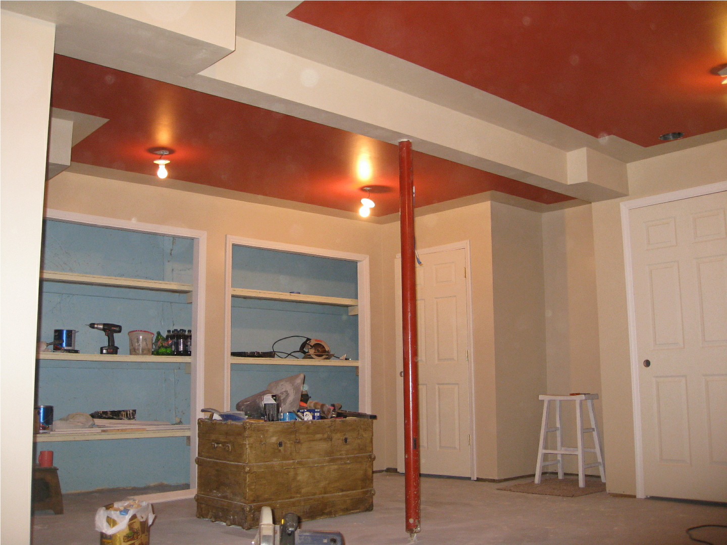 Kammy's Korner: Built-In Basement Shelving {Curtain Closure}