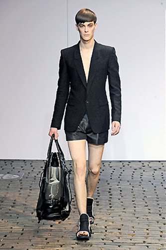 Boys in short shorts: Fit fashion model in short shorts