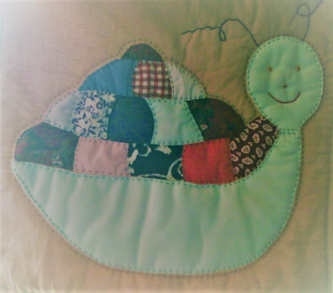 snail applique cushion | All about patchwork and quilting