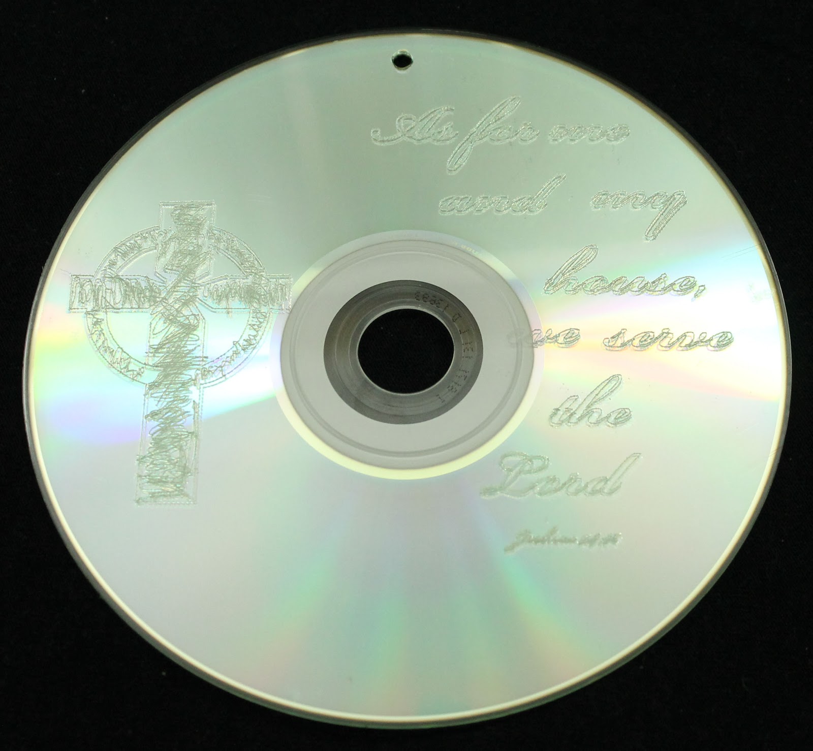 Boss Kut: Engraving a CD by Kenya G