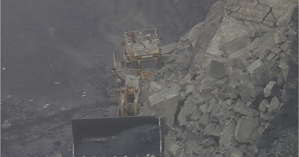 Mining Mayhem: Highwall Failure onto Loader