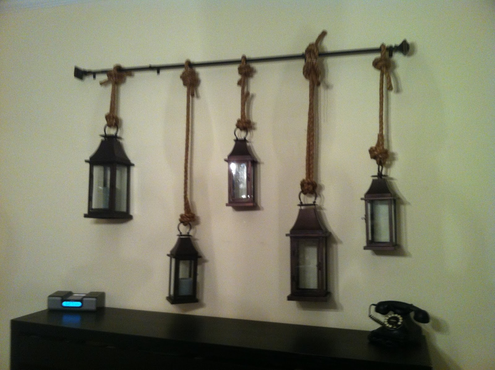 a peek into chic: DIY: Lantern Wall Display