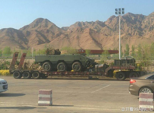 SNAFU!: New Chinese 6x6 Wheeled APC via China Defense Blog.
