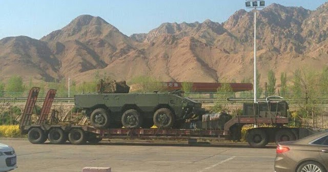 SNAFU!: New Chinese 6x6 Wheeled APC via China Defense Blog.