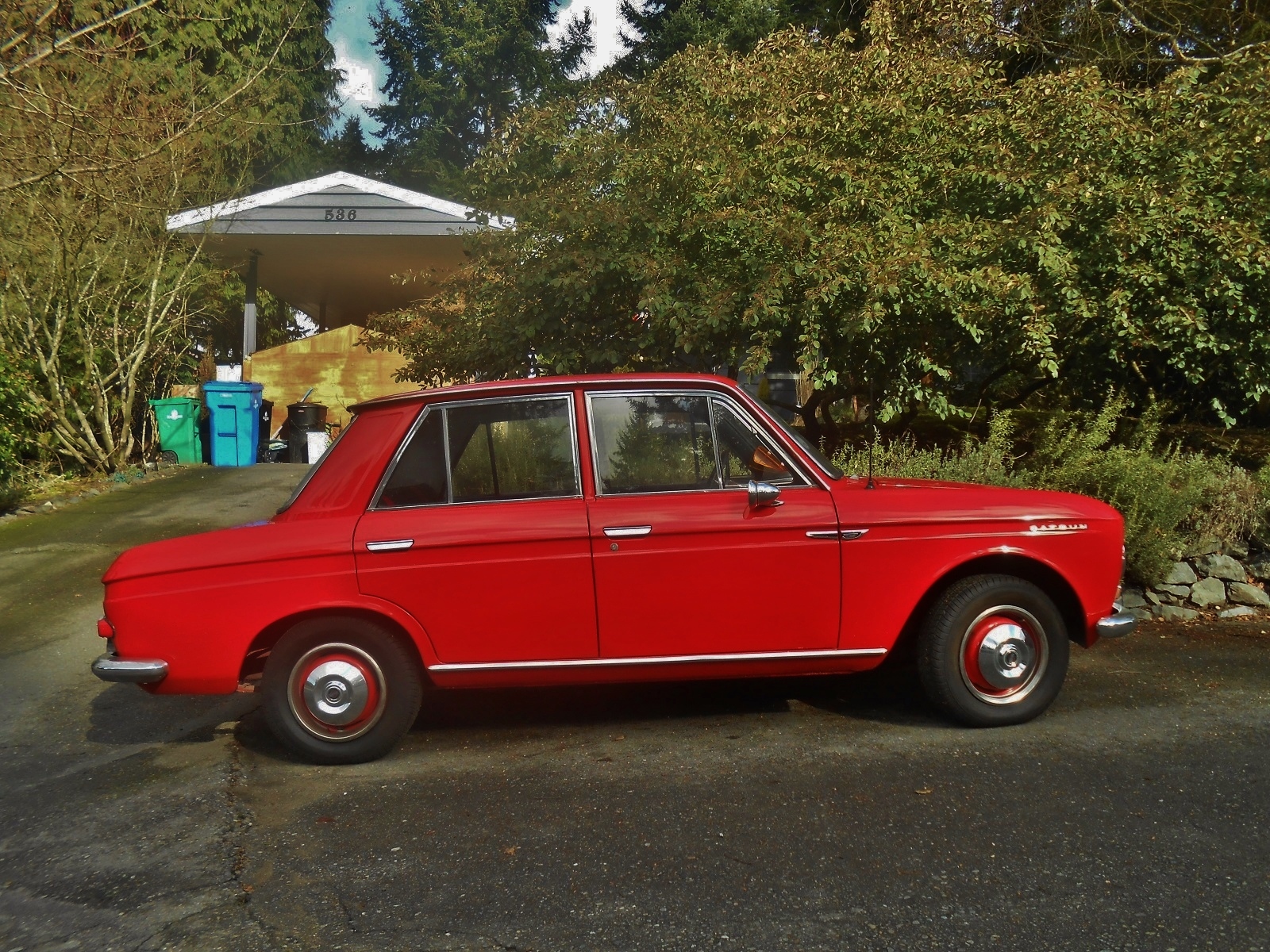 Seattle's Parked Cars: 1966 Datsun 411 Sedan