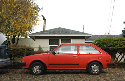 OLD PARKED CARS.: 1985 Mazda GLC.