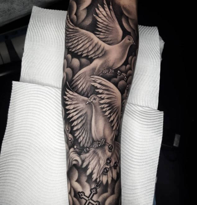 Arm Rip Tattoos With Doves - Best Tattoo Ideas