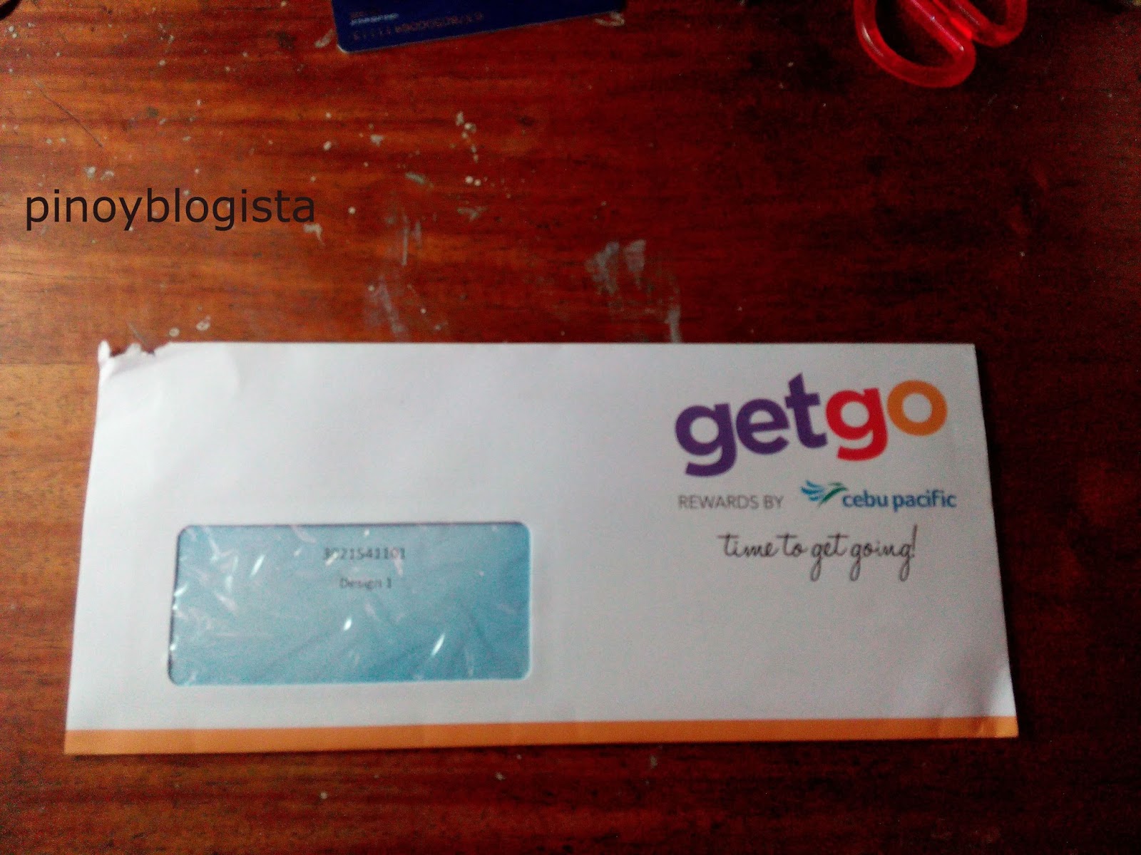 handwritten stitches: Cebu Pacific's GetGo card, and Taiwan travel fair.