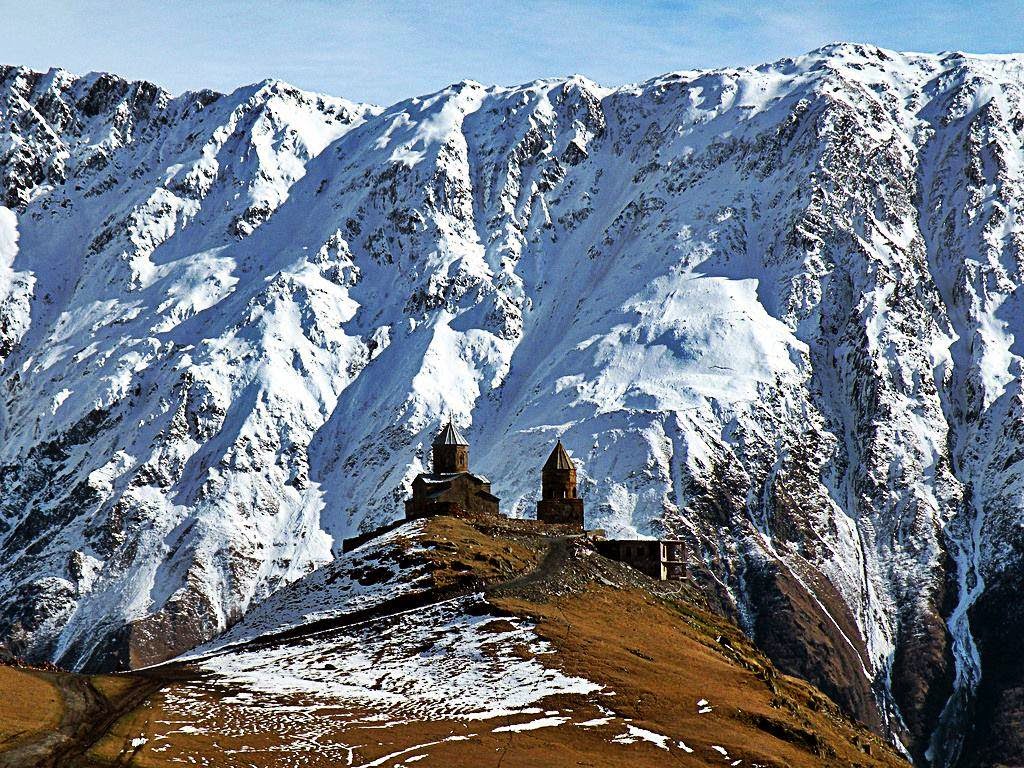 Amazing Holidays In Georgia : Gergeti Trinity Church in Mount Kazbegi ...