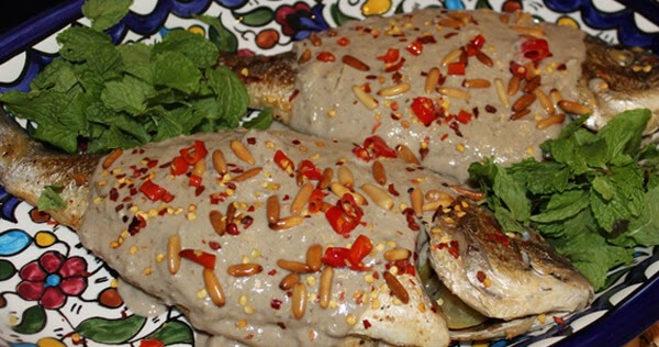 Lebanese baked spicy fish in with tahini sauce recipe | LEBANESE RECIPES