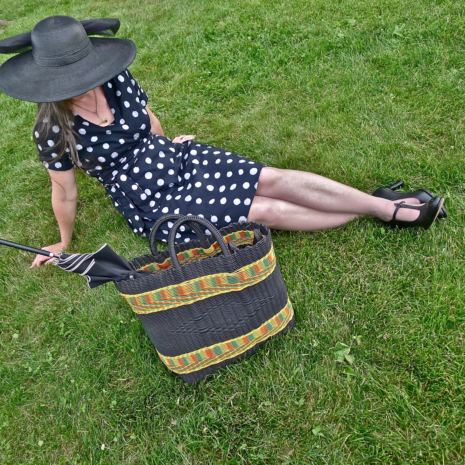 evolution now: belmont stakes- suits, dresses, hats at the races.