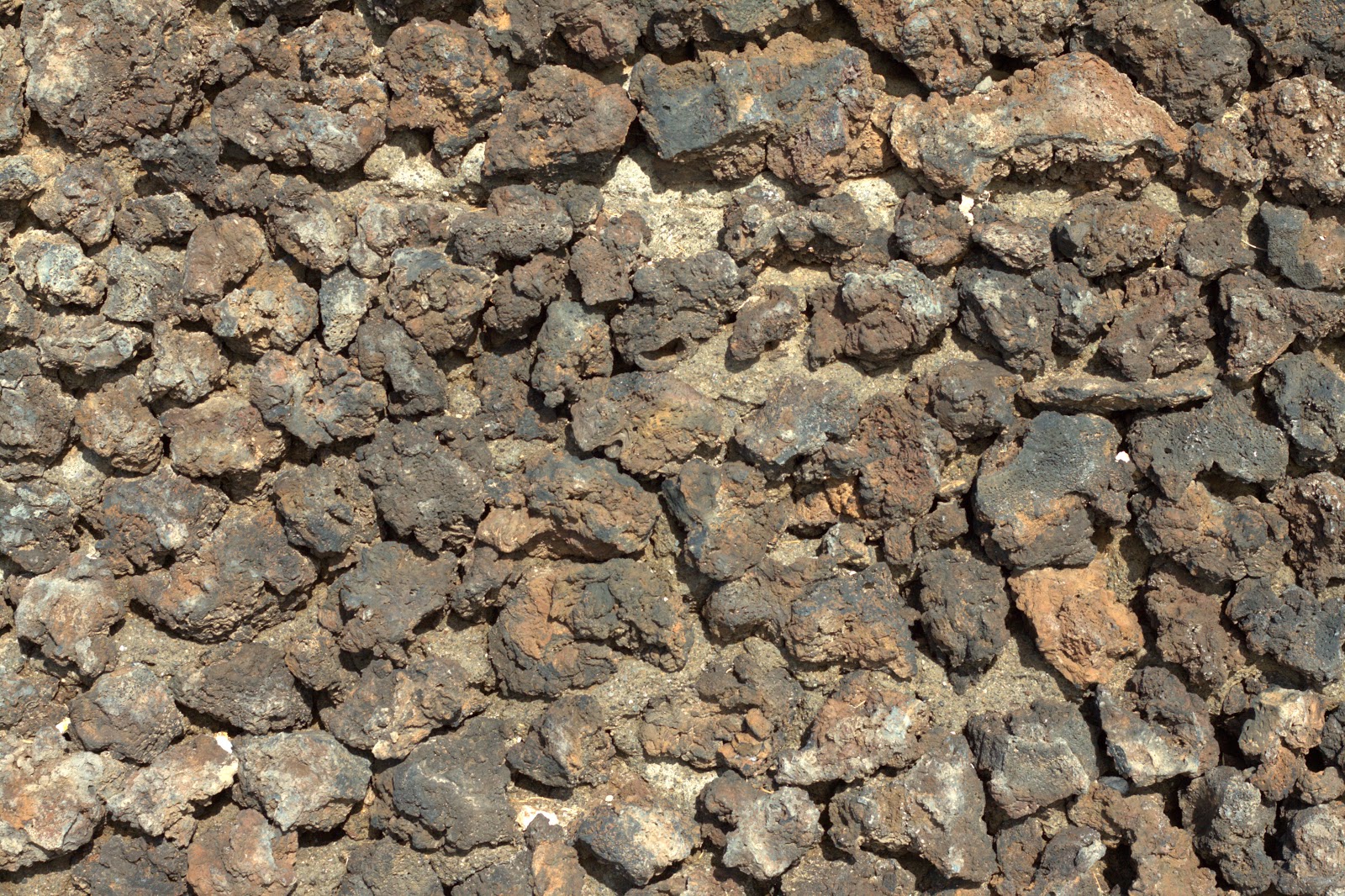 HIGH RESOLUTION TEXTURES: Rocky stone coloured wall texture 4770x3178