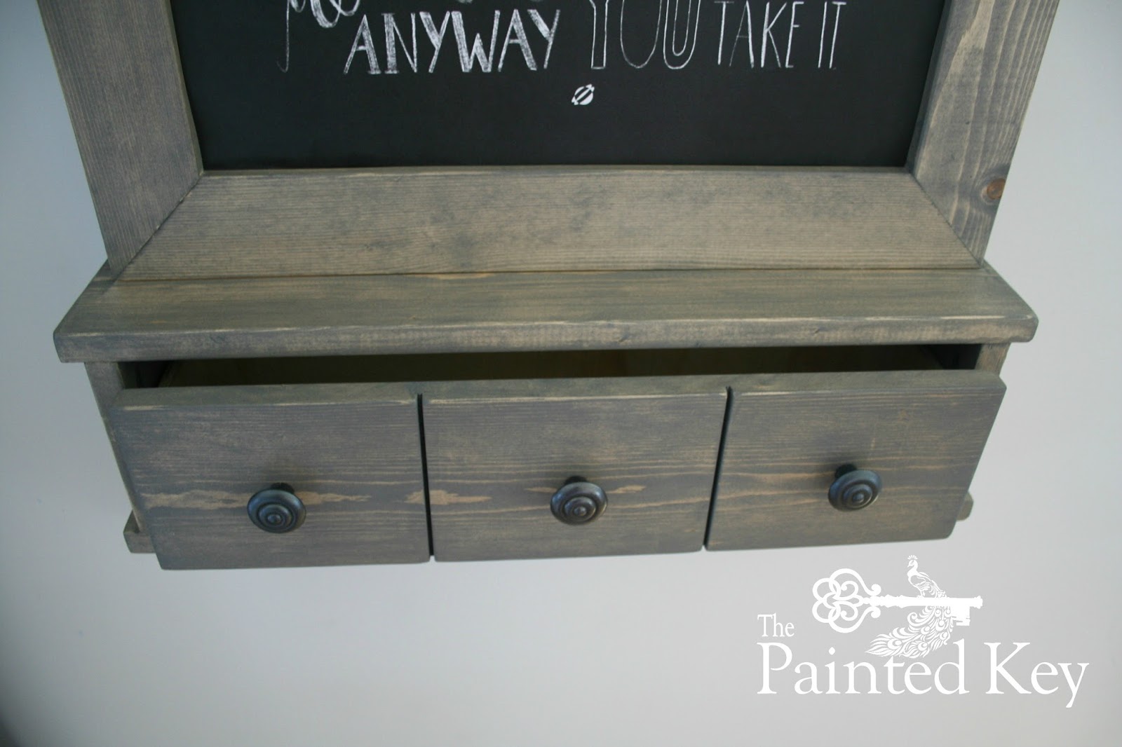 The Painted Key: Hidden Storage Cabinet