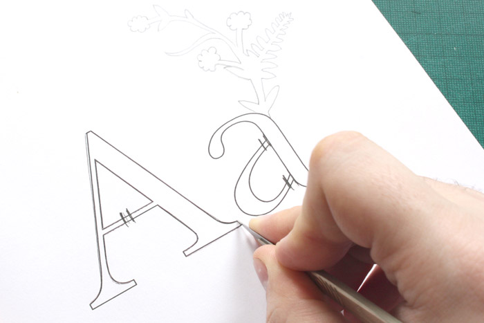 DIY: Customized Initial Papercut by Mr. Yen | Poppytalk archive