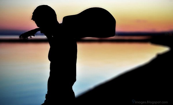 sad alone boy emotions loneliness guitar sunset | Soho Images