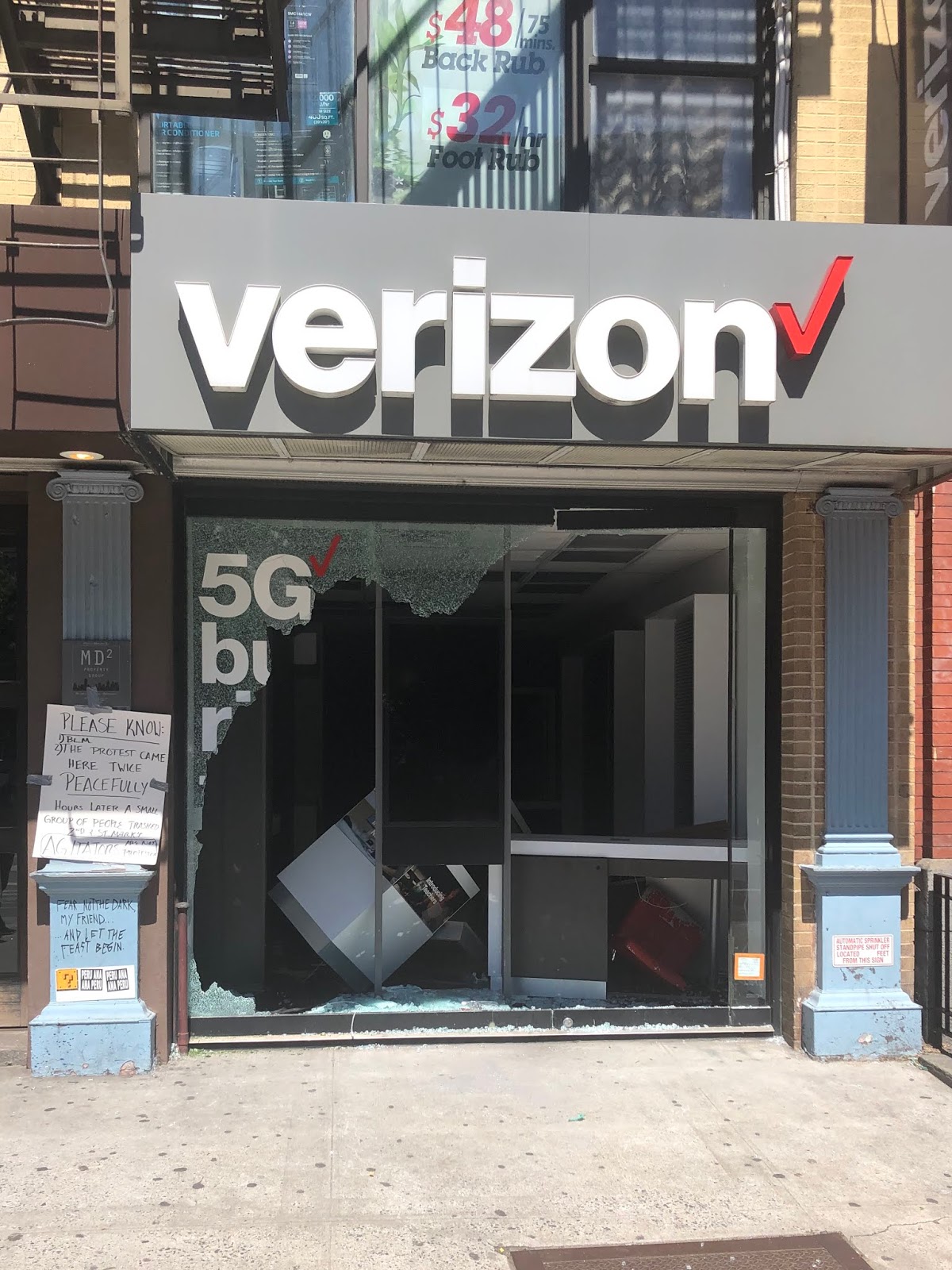 EV Grieve: A sign outside Verizon: 'Agitators are not protestors'