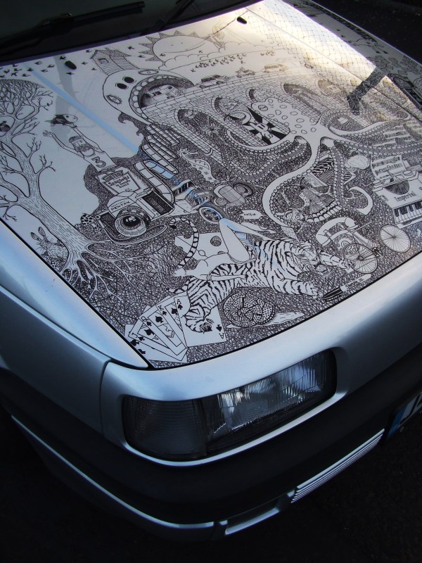 Just A Car Guy: how to hide a dent... use 6 sharpie markers and a lot ...