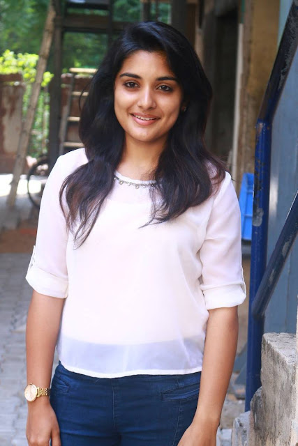 Niveda Thomas Latest Glamour PhotoShoot Images At Thoongavanam Audio ...