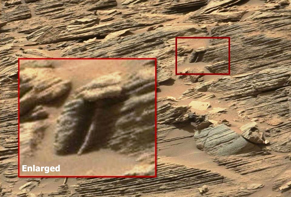 Stunning carved Martian Stone Head stands at the entrance to a Cave