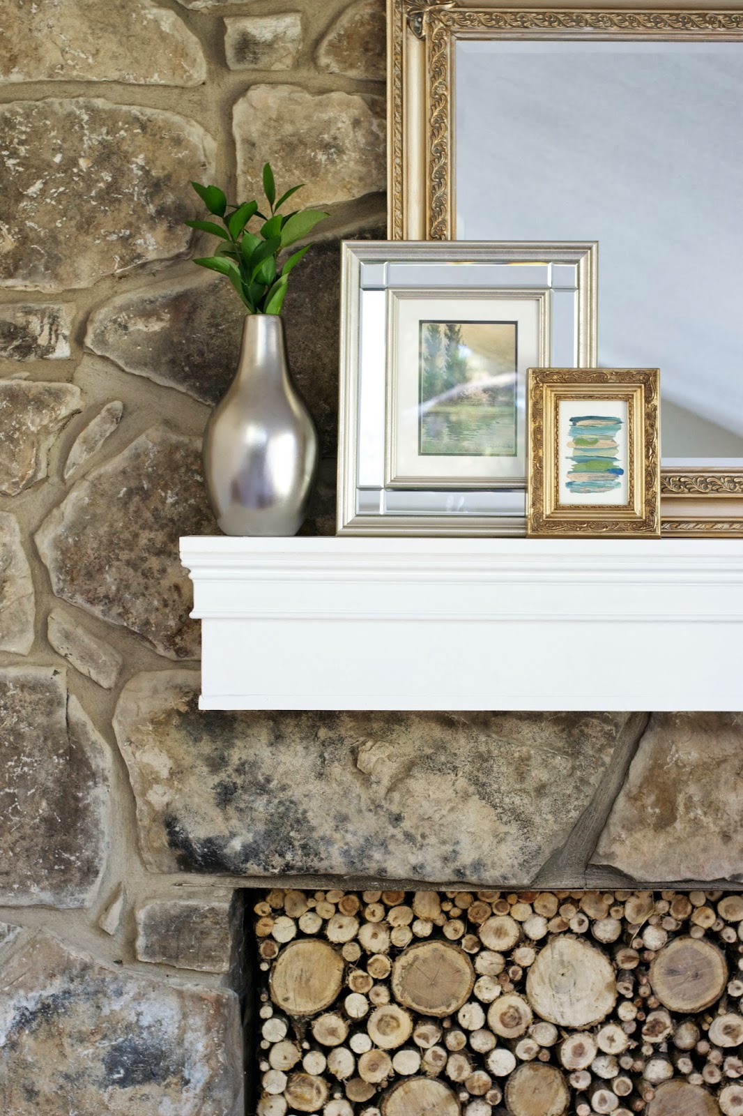 Faux Stacked Log Fireplace Tutorial | LiveLoveDIY | Bloglovin’