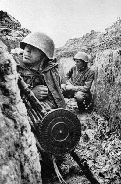 World War II History: Soviet troops in a trench in Leningrad, Russia, 1 ...