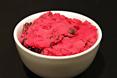 Pink mashed potatoes with beets and beet greens
