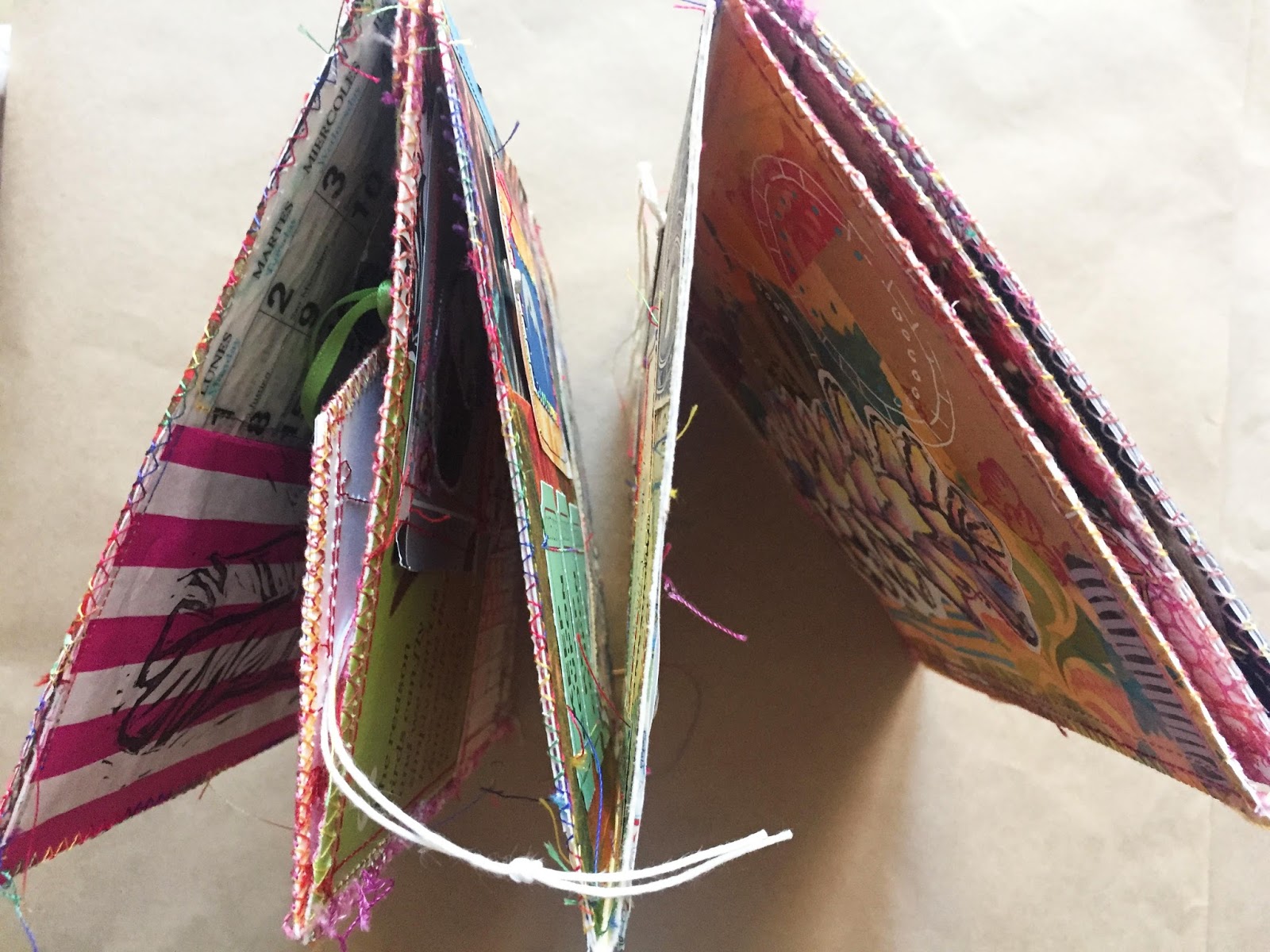 JaneVille: A video of a little stitched book. Made my me.