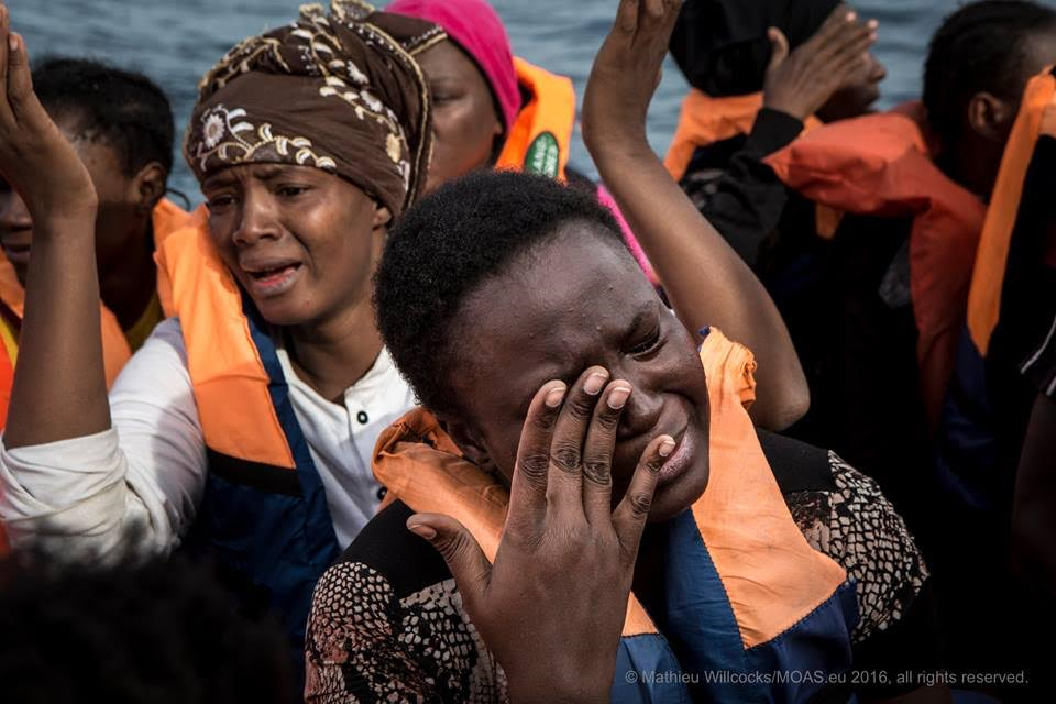 Photos: Over 500 African migrants including pregnant women and children ...
