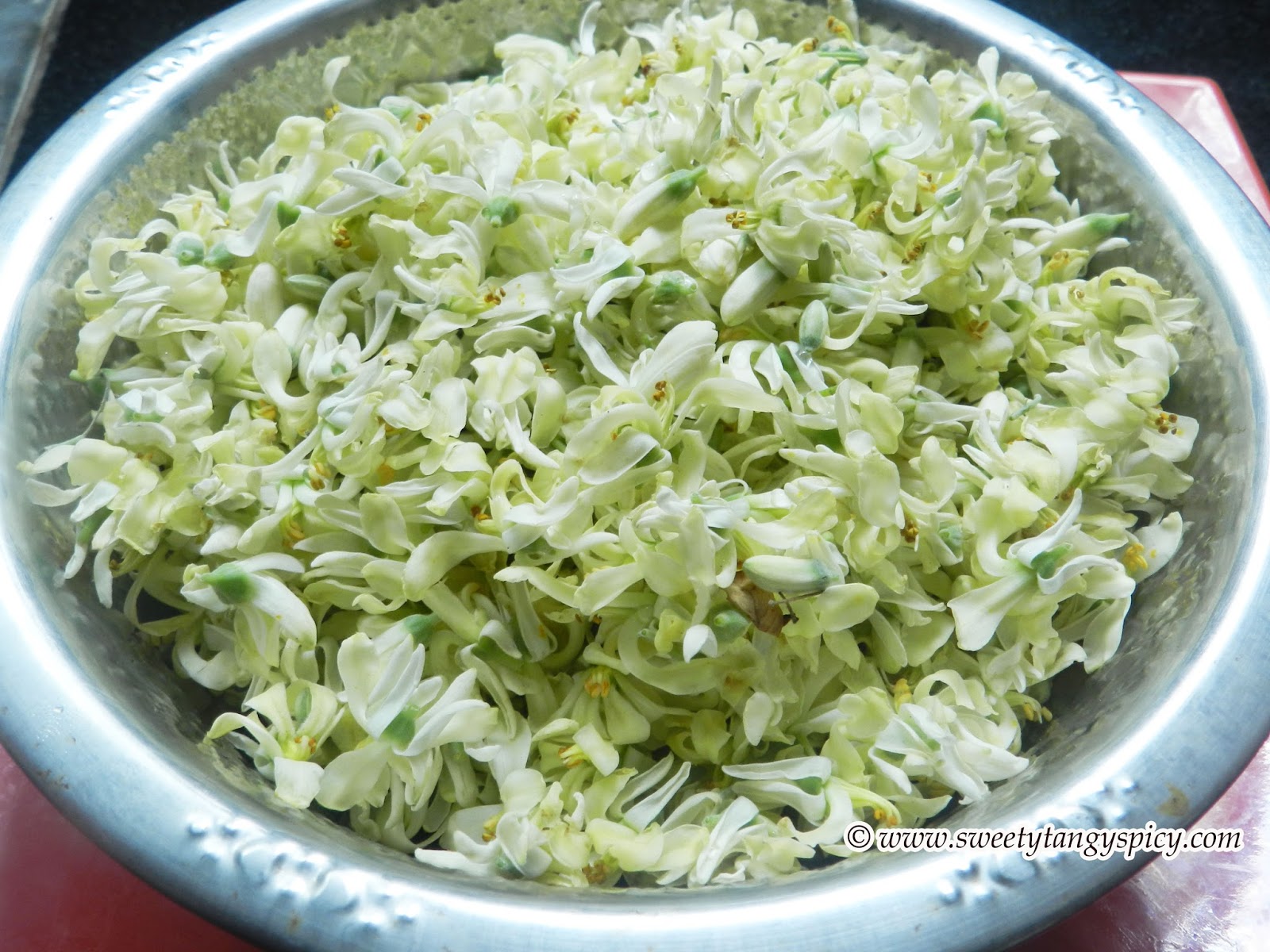 Pluck each flower carefully from the stem.