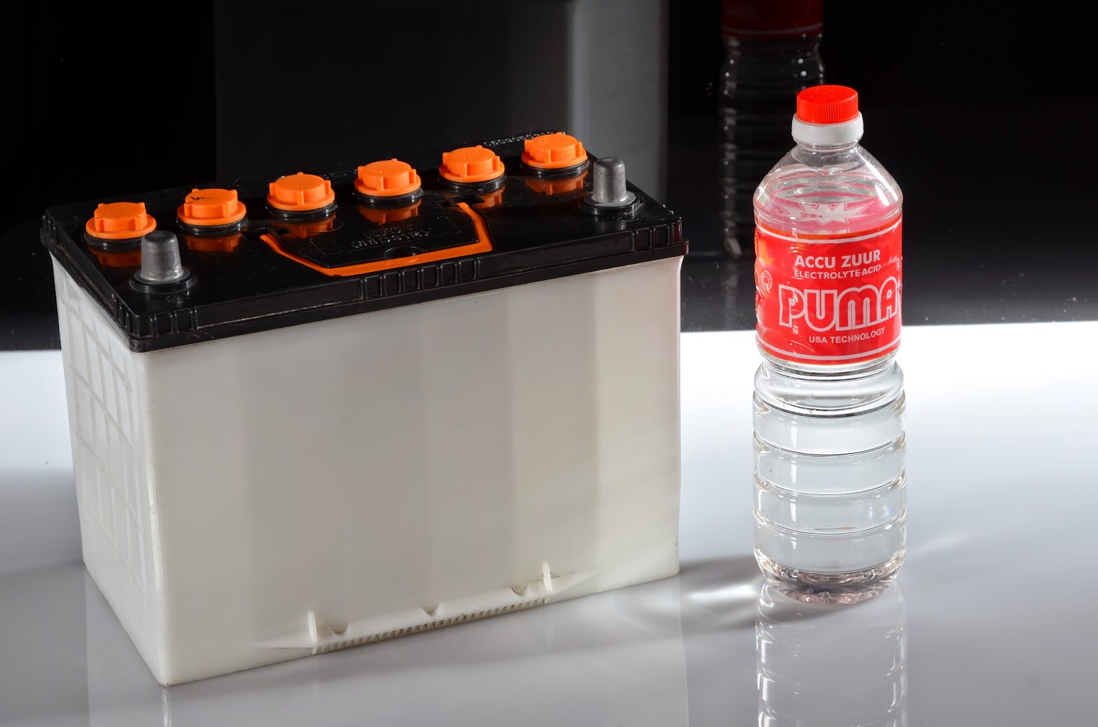 ACCU ZUUR dan AIR ACCU PUMA: Accu Zuur / Battery Electrolyte PUMA