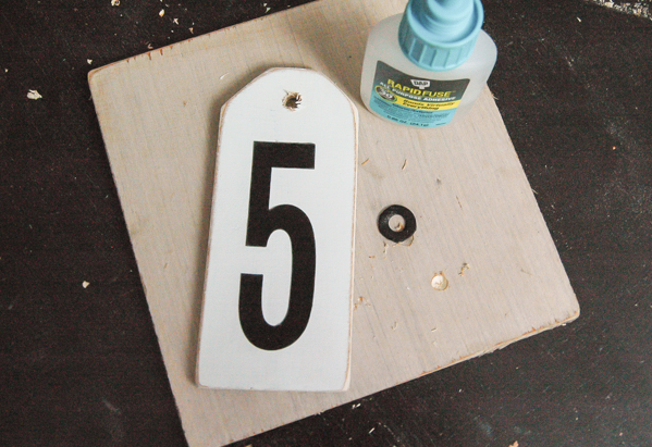 Plywood Scraps Turned Distressed Number Tags | Little House of Four ...