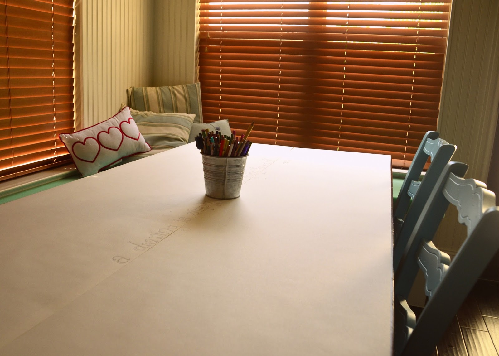 Nessa Dee: butcher paper + table top