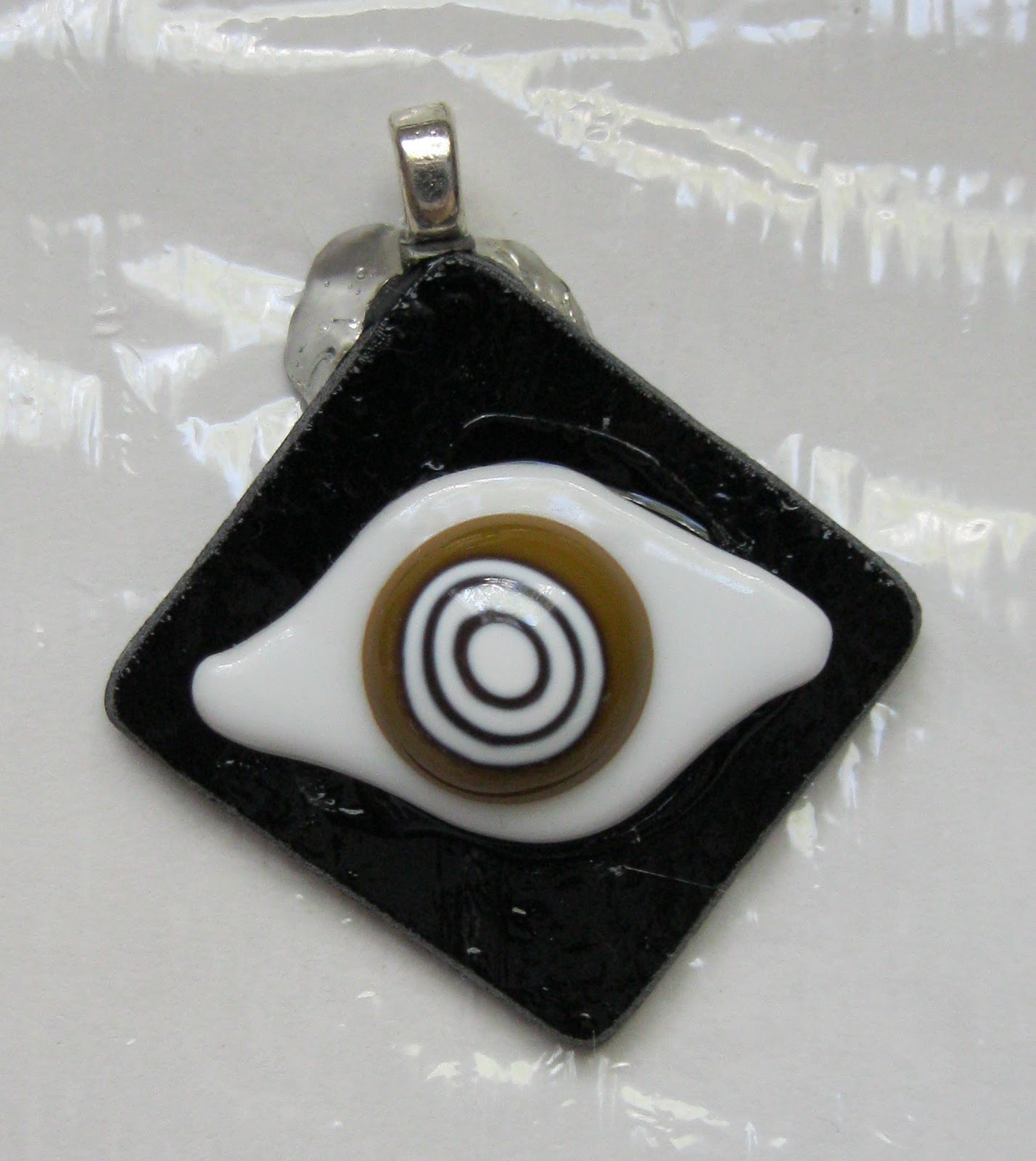 PLAYING WITH FIRE: Evil Eye Talisman