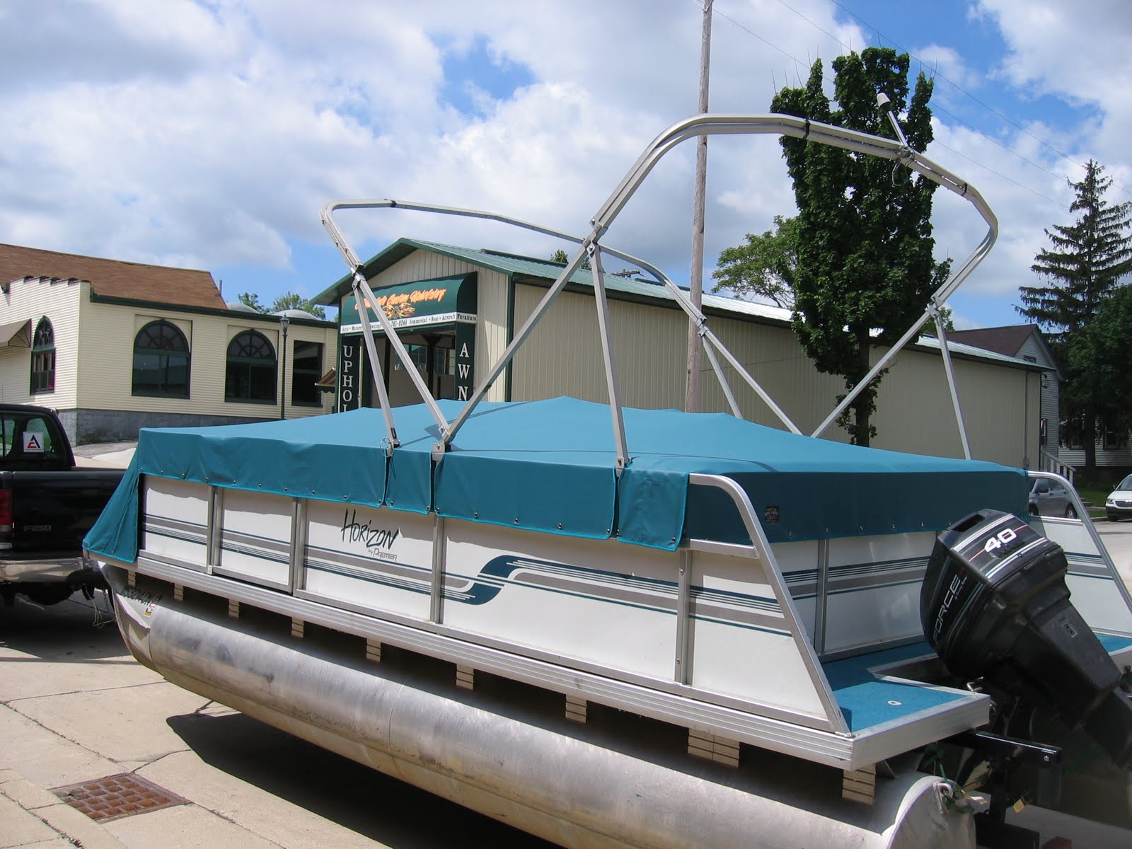Homestyle Custom Upholstery and Awning: New top for a Pontoon boat
