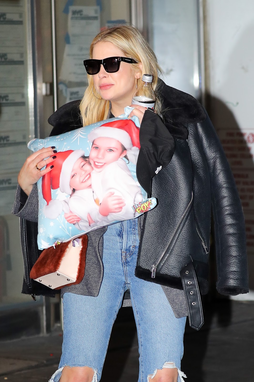 Ashley Benson showing a picture of her and her sister as children ...