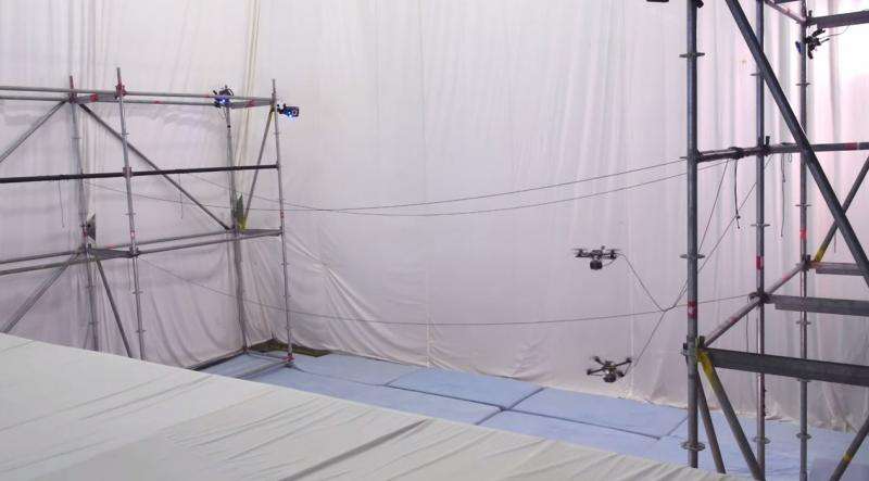 Quadcopter drones built a rope bridge that humans could walk across ...